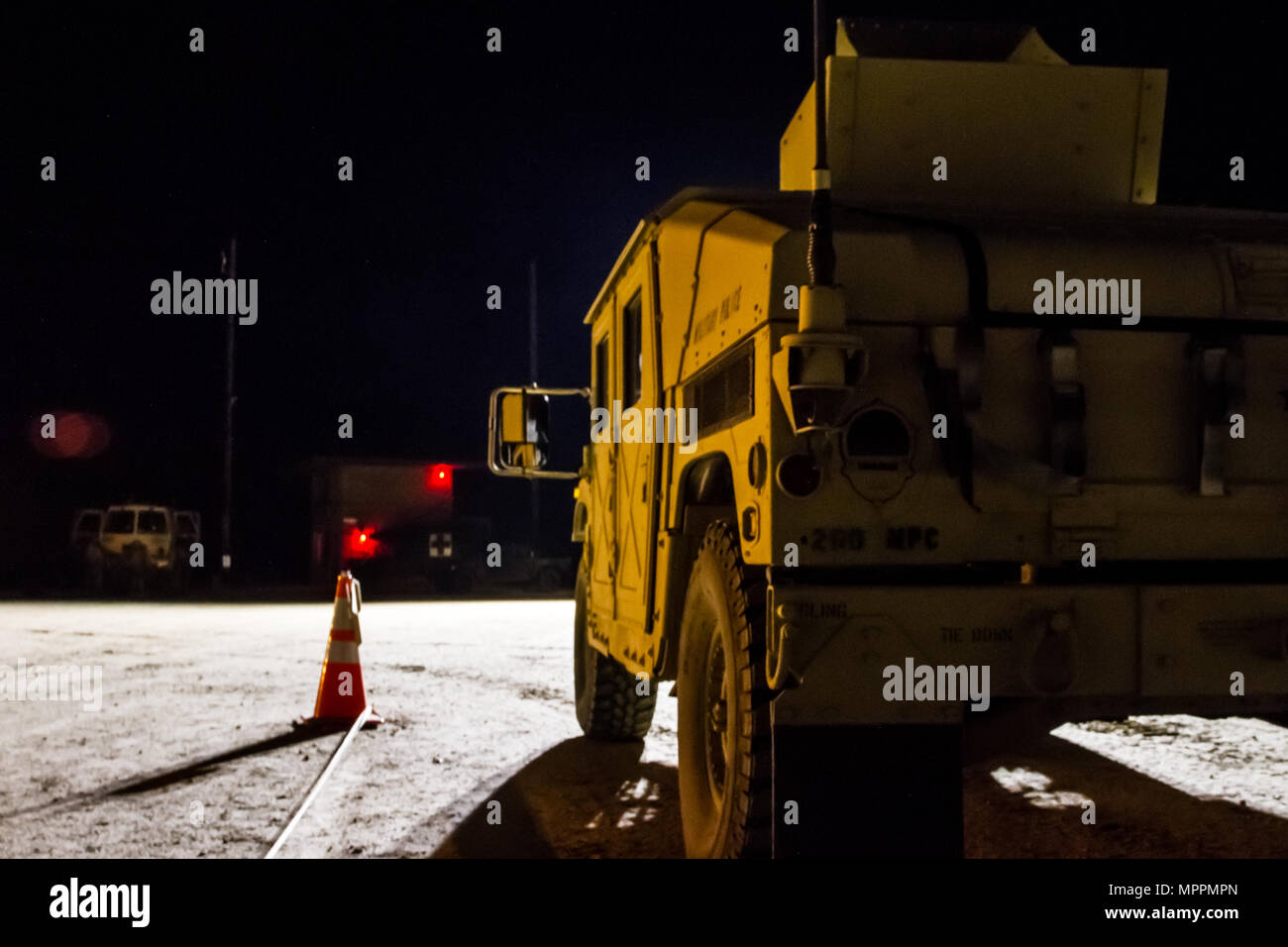 A Humvee is staged preparation for night-fire qualification as part of ...