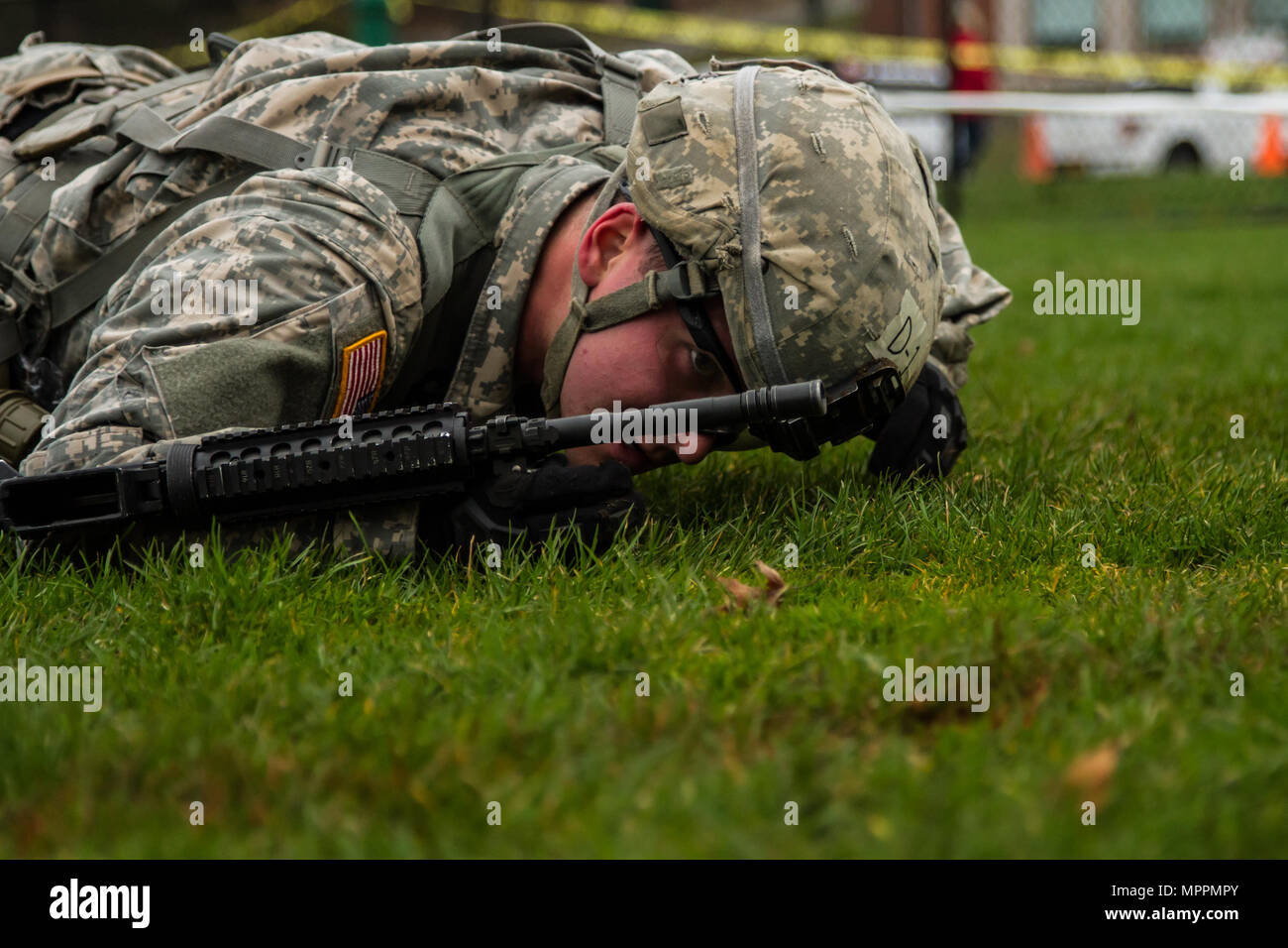 A U.S. Army cadet competes in a low-crawl event during the 2017 ...
