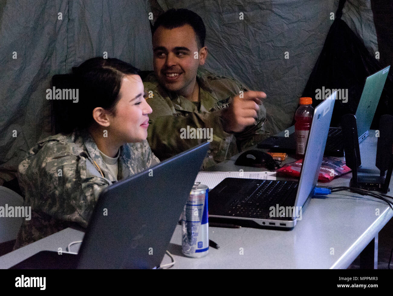 California National Guardsmen review communications on April 8, inside ...