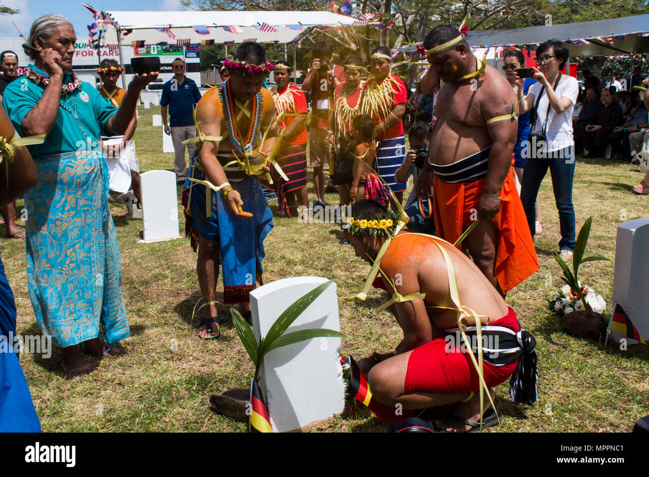 A Chamorro spiritual group conducts blessings at the graves of the ...