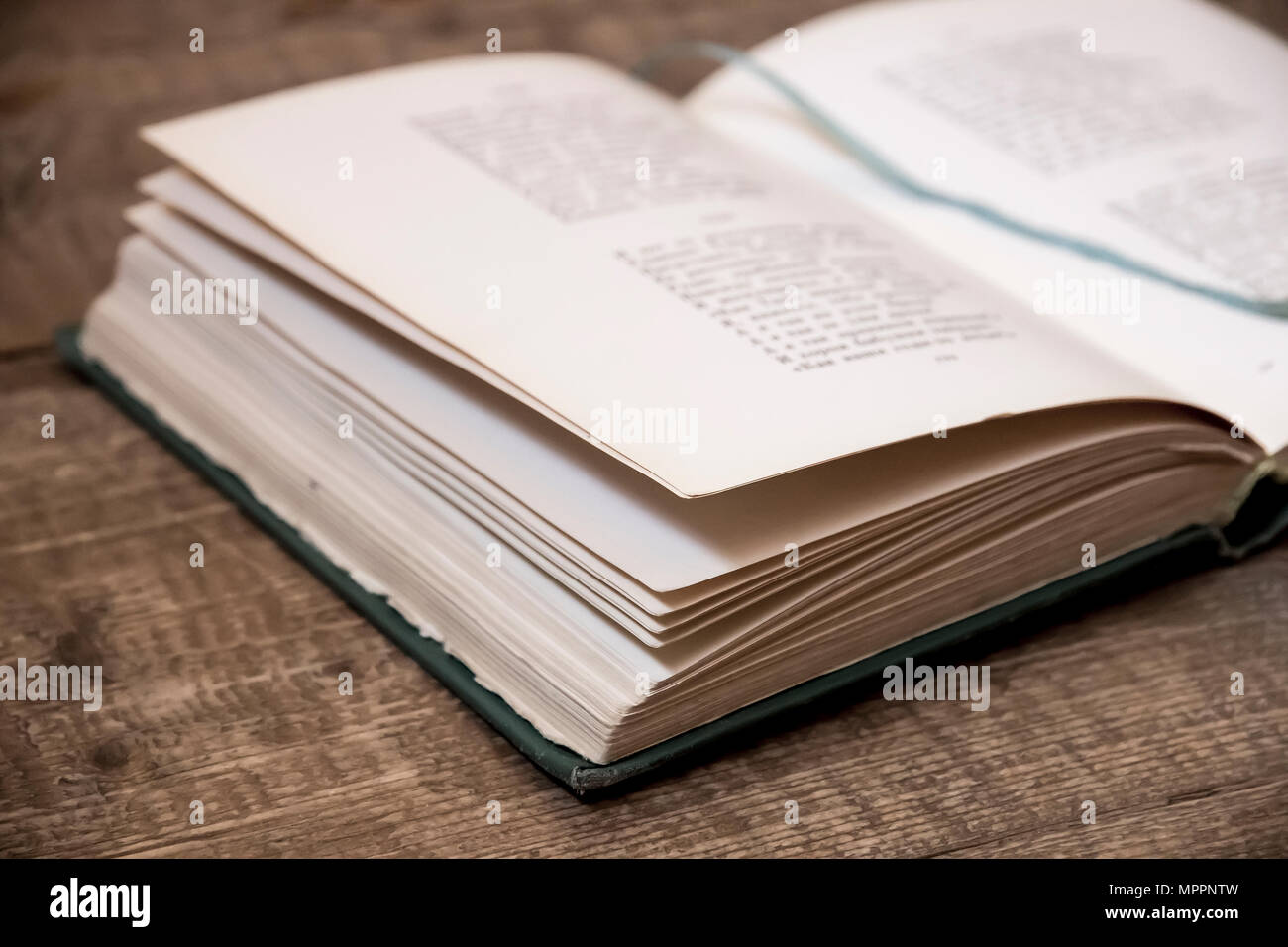 Old book open laying on hi-res stock photography and images - Alamy