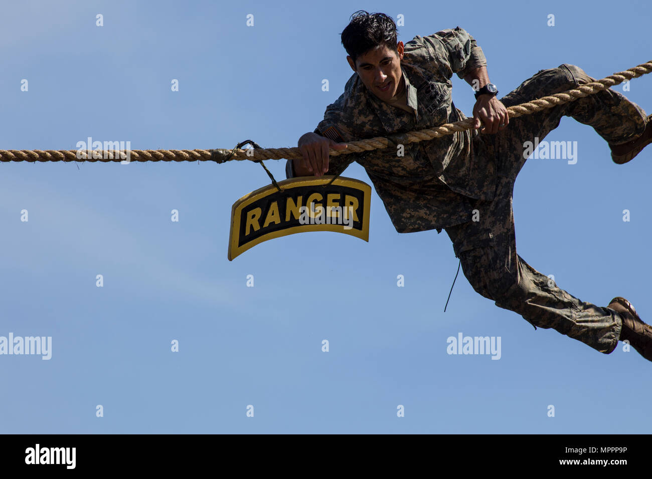 A U.S. Army Ranger touches the Ranger tab at the Combat Water Survival ...