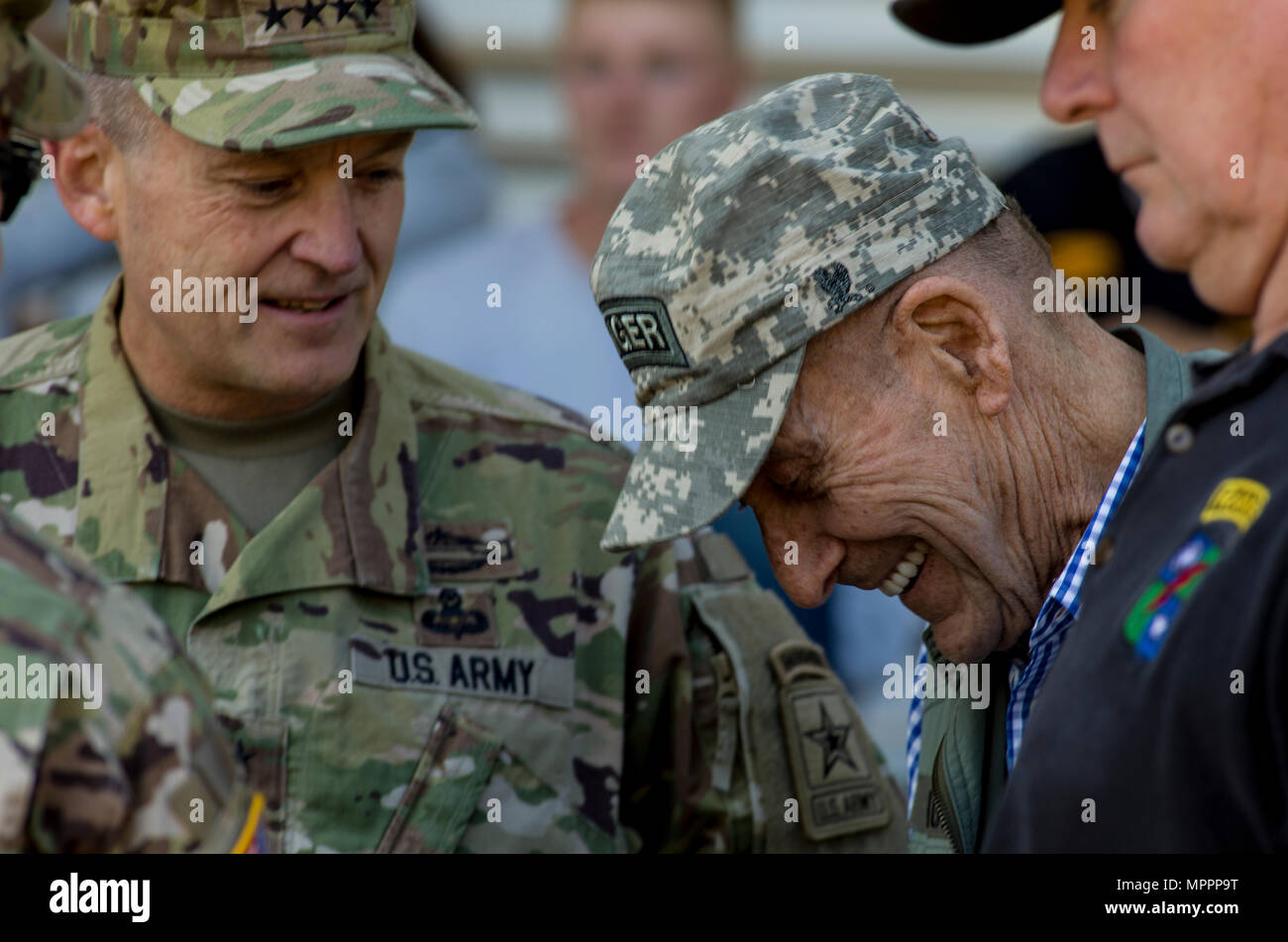 Retired Lt. Gen. David E. Grange converses with Gen. Daniel B. Allyn ...