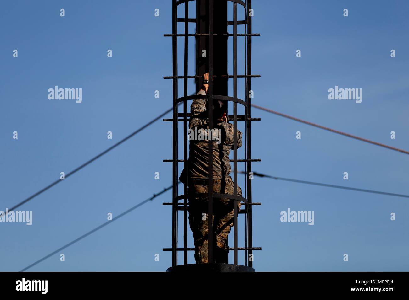 A U.S. Army Ranger climbs a ladder during the Best Ranger Competition ...