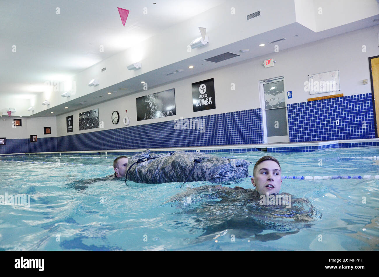 Sgt. Nicholas Shidlovsky and 2nd Lt. Gregory Gerlach, both assigned to ...