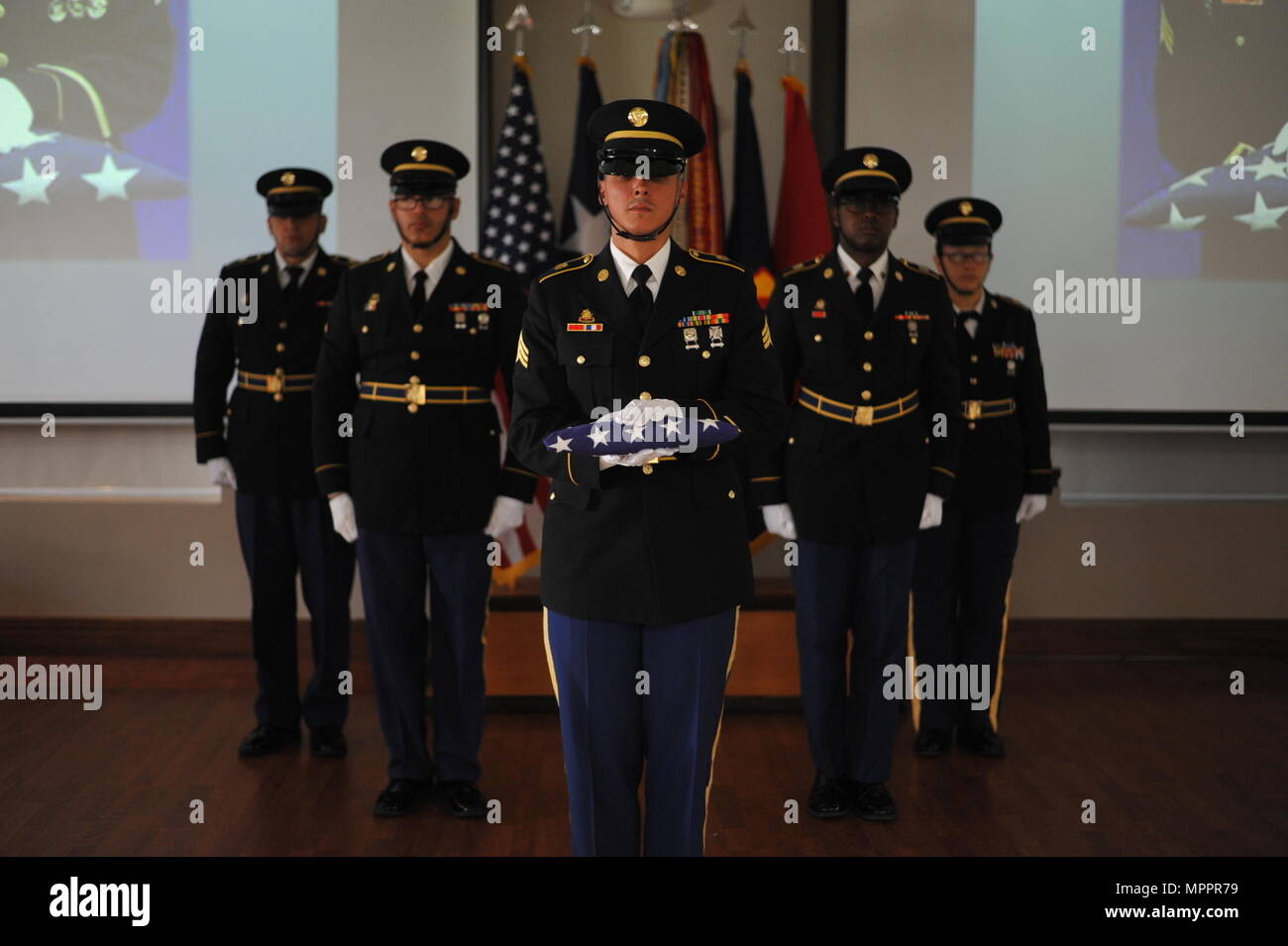 Members of the 1st Mission Support Command Honor Guard present the ...