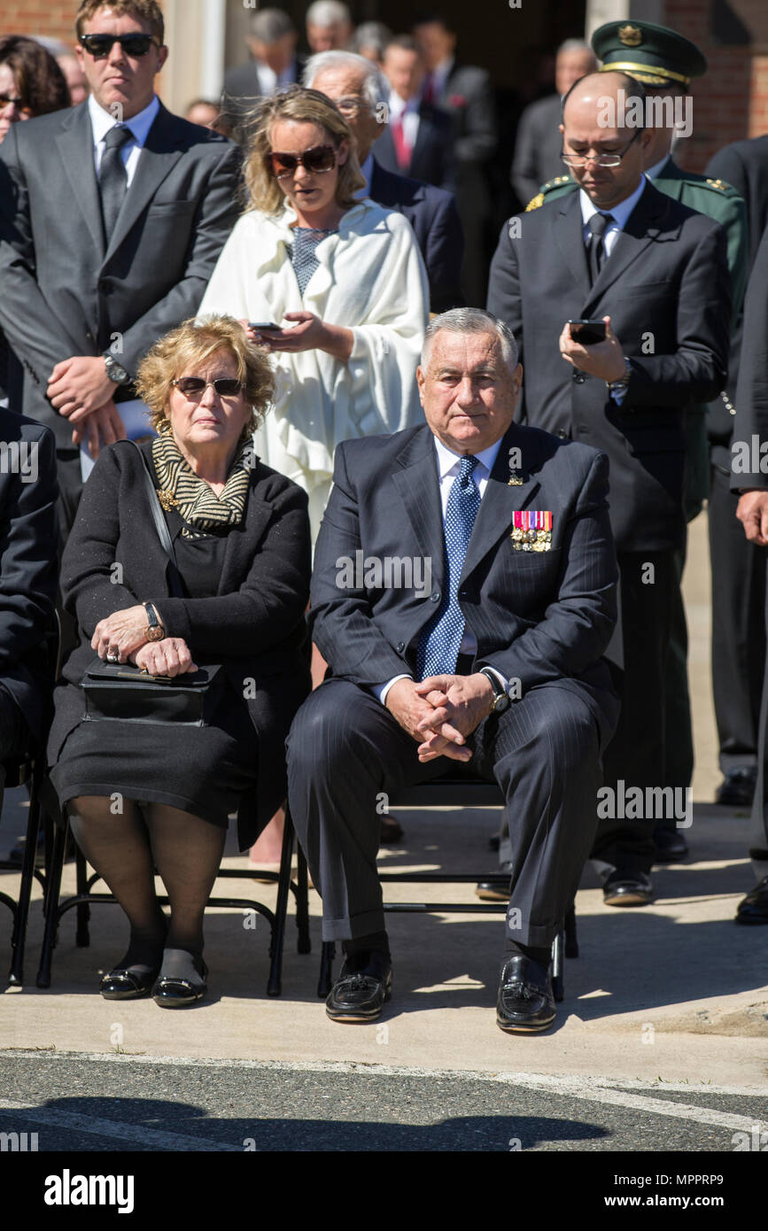 Retired U.S. Marine Corps Lt. Col. John S. Snowden sits with family ...