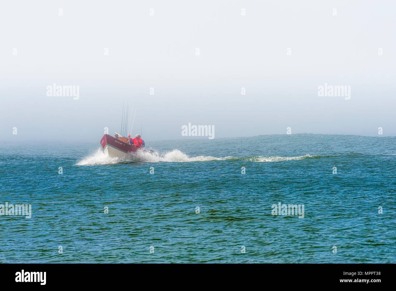 Pacific City, Oregon, USA - July 2, 2015: A dory boat coming in from ...