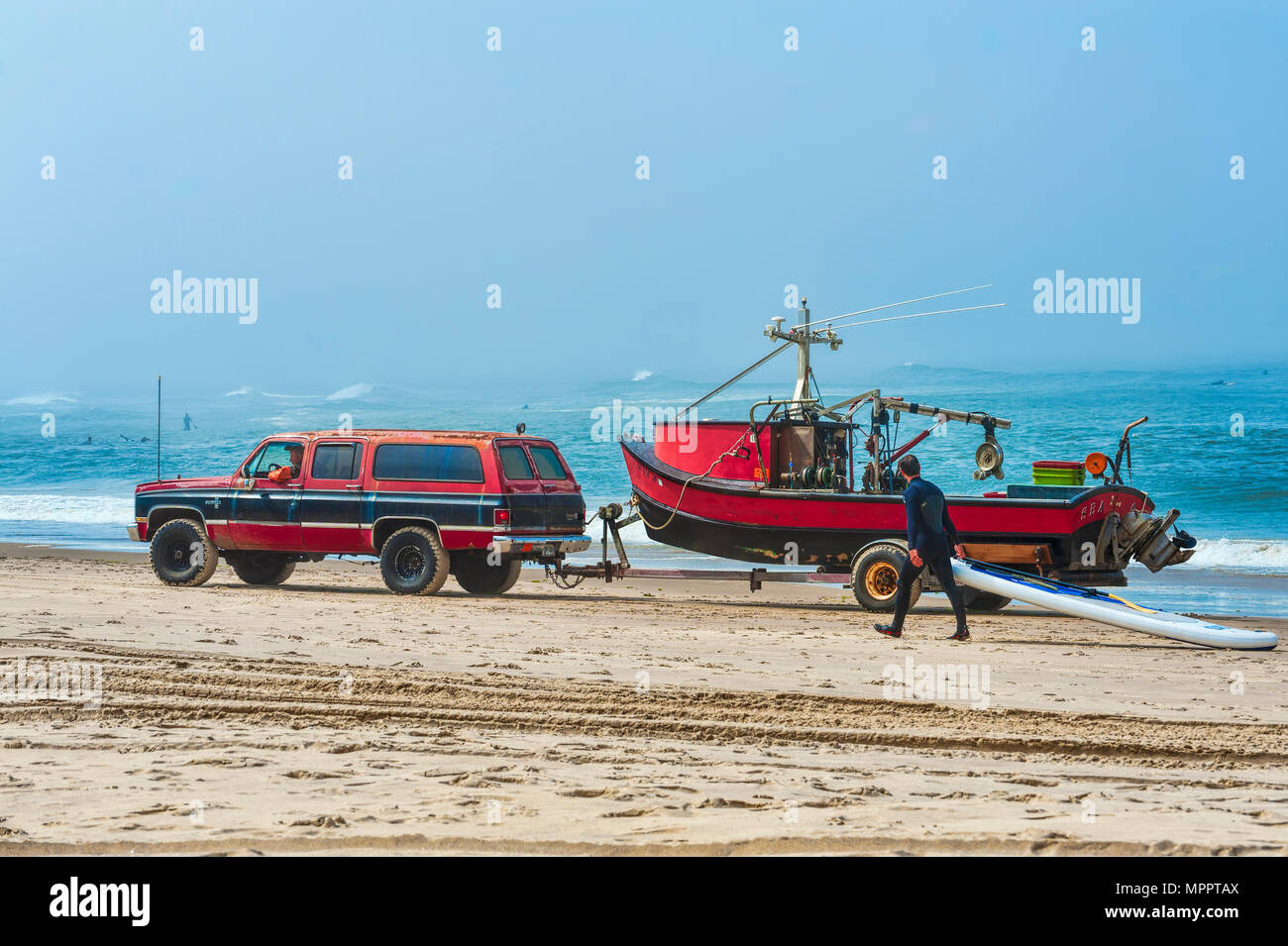 Pacific City, Oregon, USA - July 2, 2015: A red and black 4-wheel SUV ...