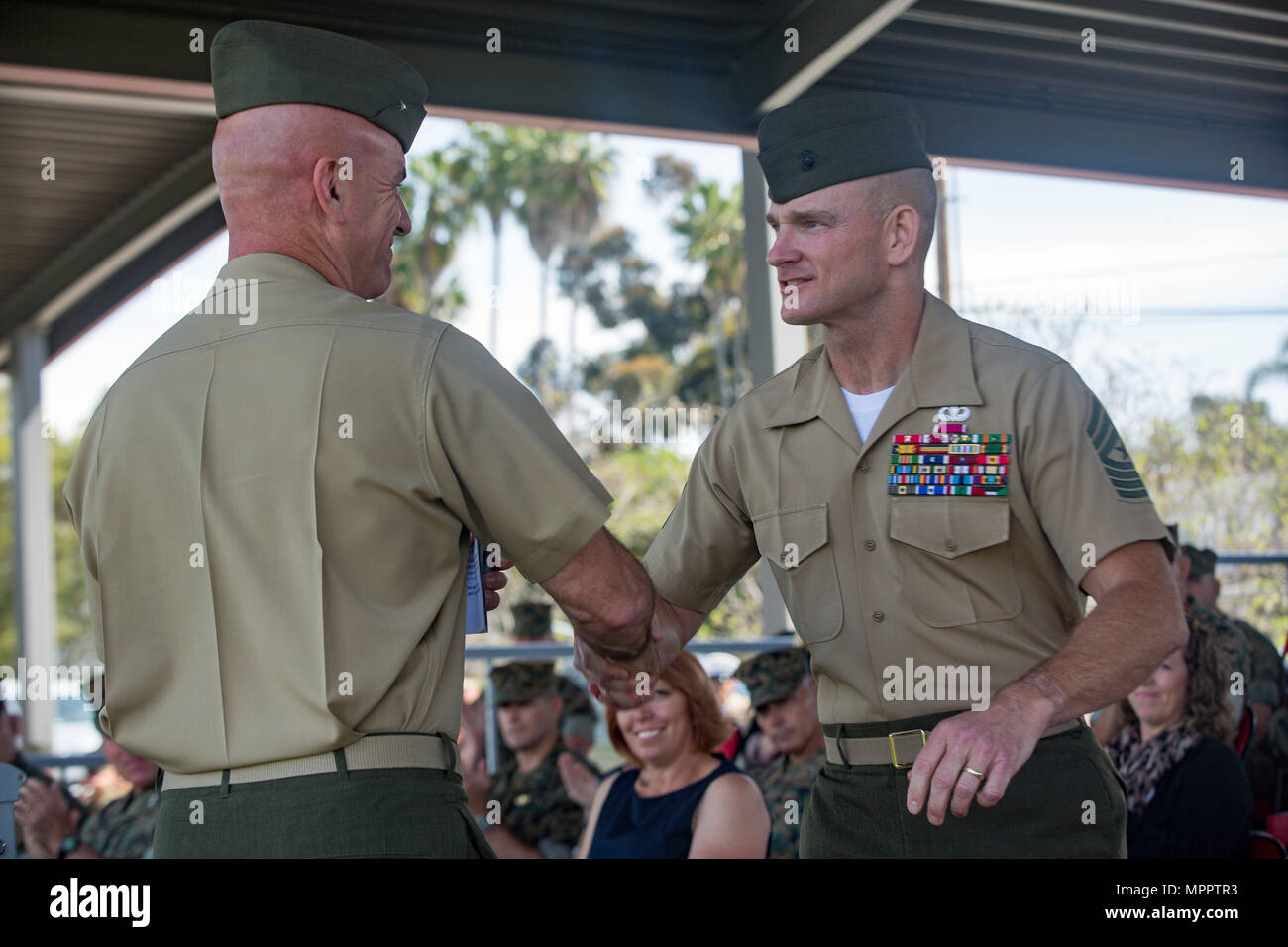 U.S. Marine Sgt. Maj. Troy E. Black shakes hands with Brig. Gen. David ...