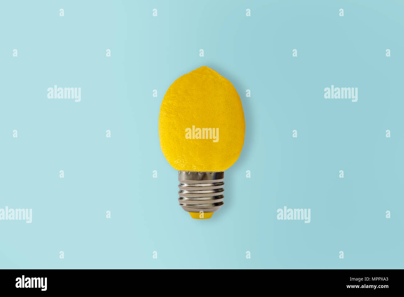 Yellow Lemon light bulb on bright blue background. Summer fun concept ...