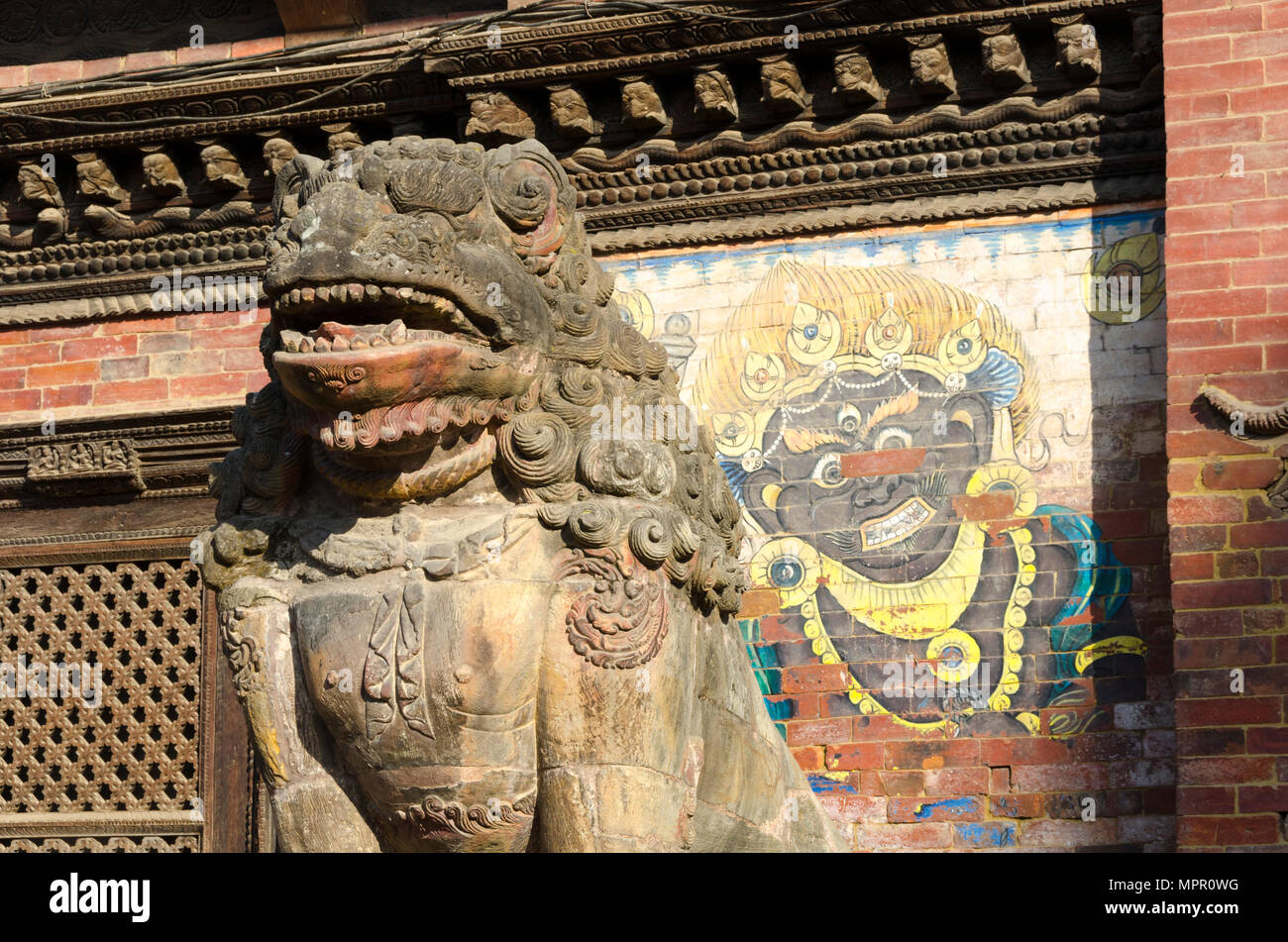 Lion statue and painting of deity, Patan Durbar Square, Kathmandu ...