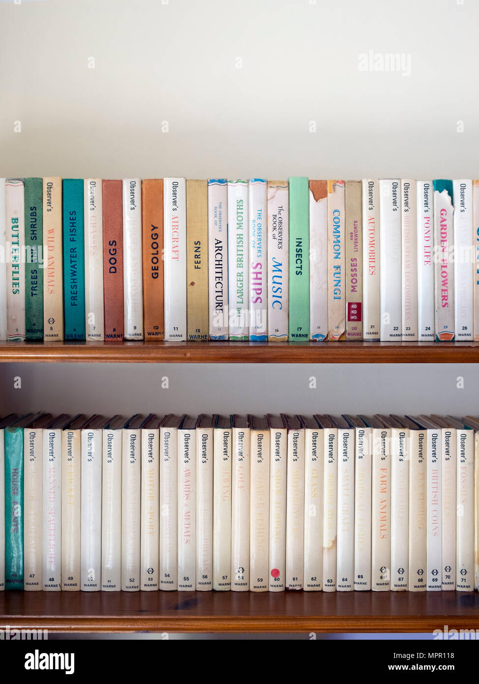 A large collection of vintage Observers books on a bookshelf. Observer ...