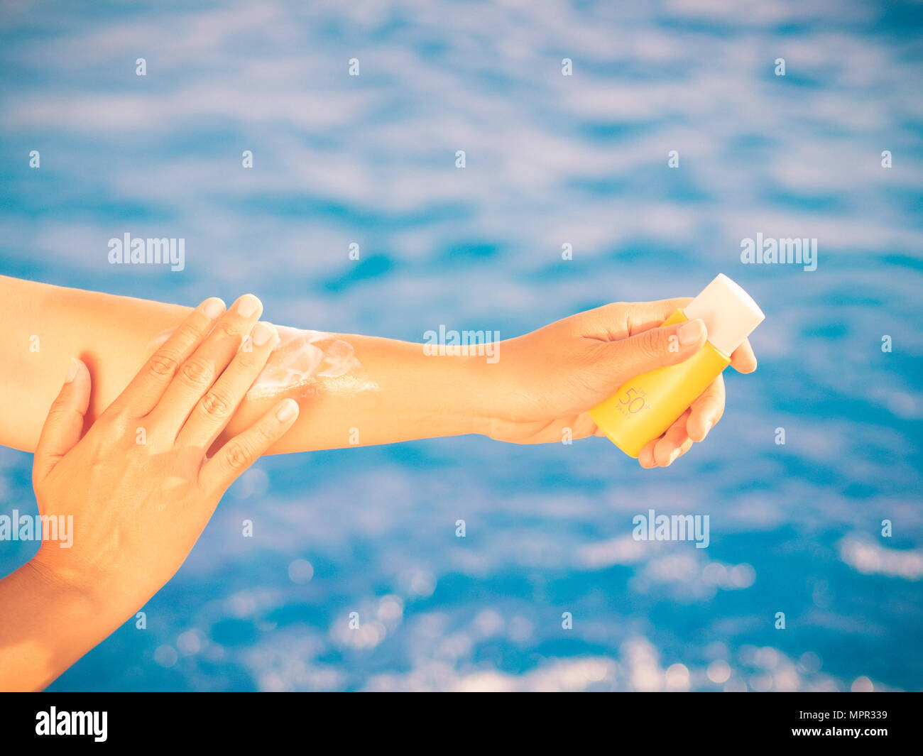 Apply Sunscreen High Resolution Stock Photography and Images - Alamy