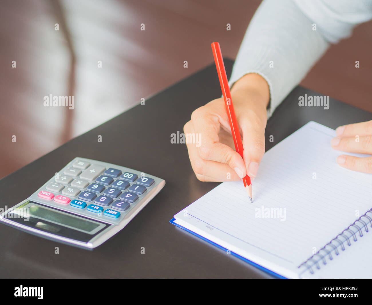 Calculator on working table hi-res stock photography and images - Alamy