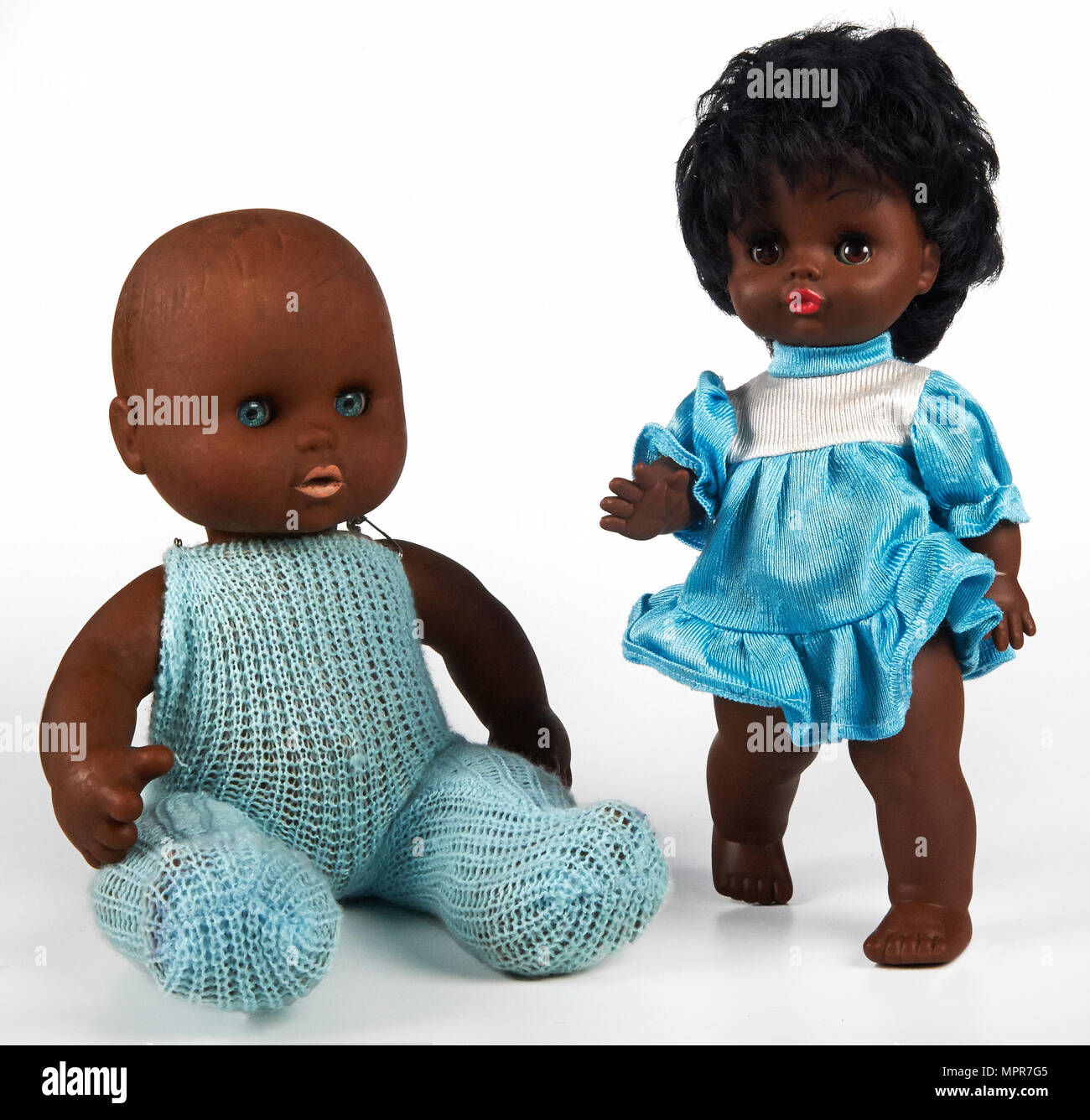 two dolls on white background Stock Photo - Alamy