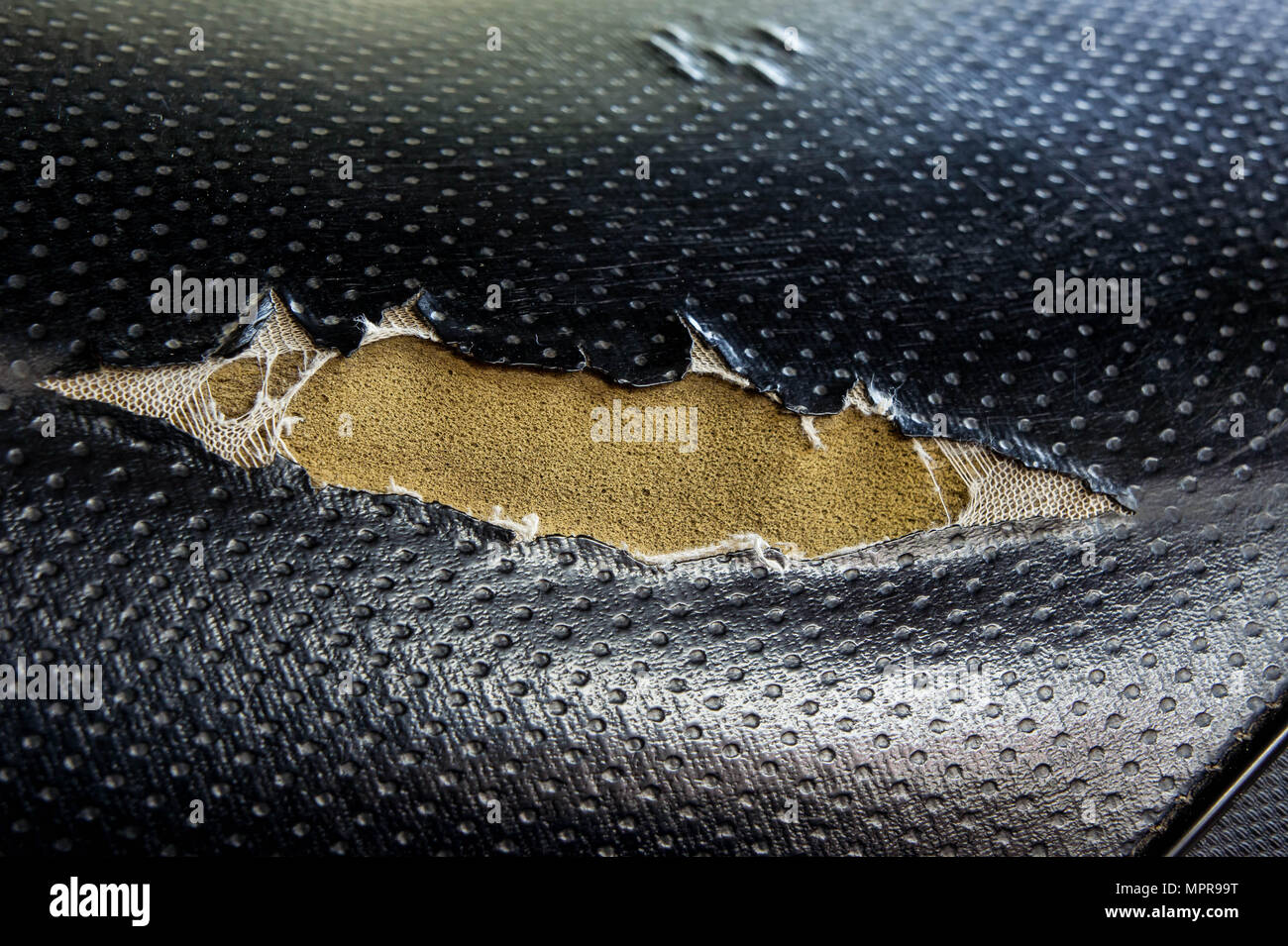 Leather upholstery . Leather seat is worn out Stock Photo - Alamy