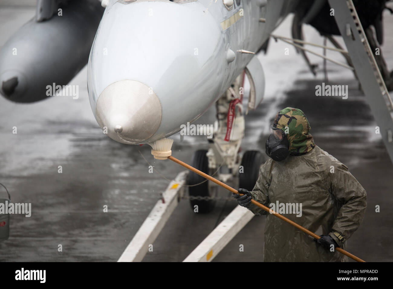 U.S. Marines conduct aircraft decontamination with Marine Fighter ...