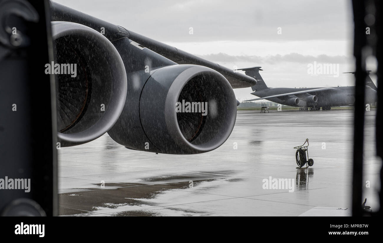 C-5 M Super Galaxy aircraft parked on the ramp on a rainy morning at Travis AFB, California, Apr ...