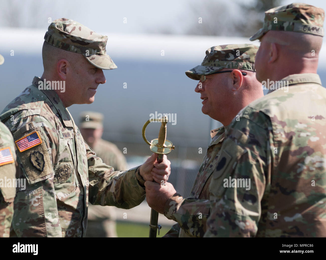 Command Sgt. Maj. Mark W. Bowman of Plainfield, Illinois, passes a ...