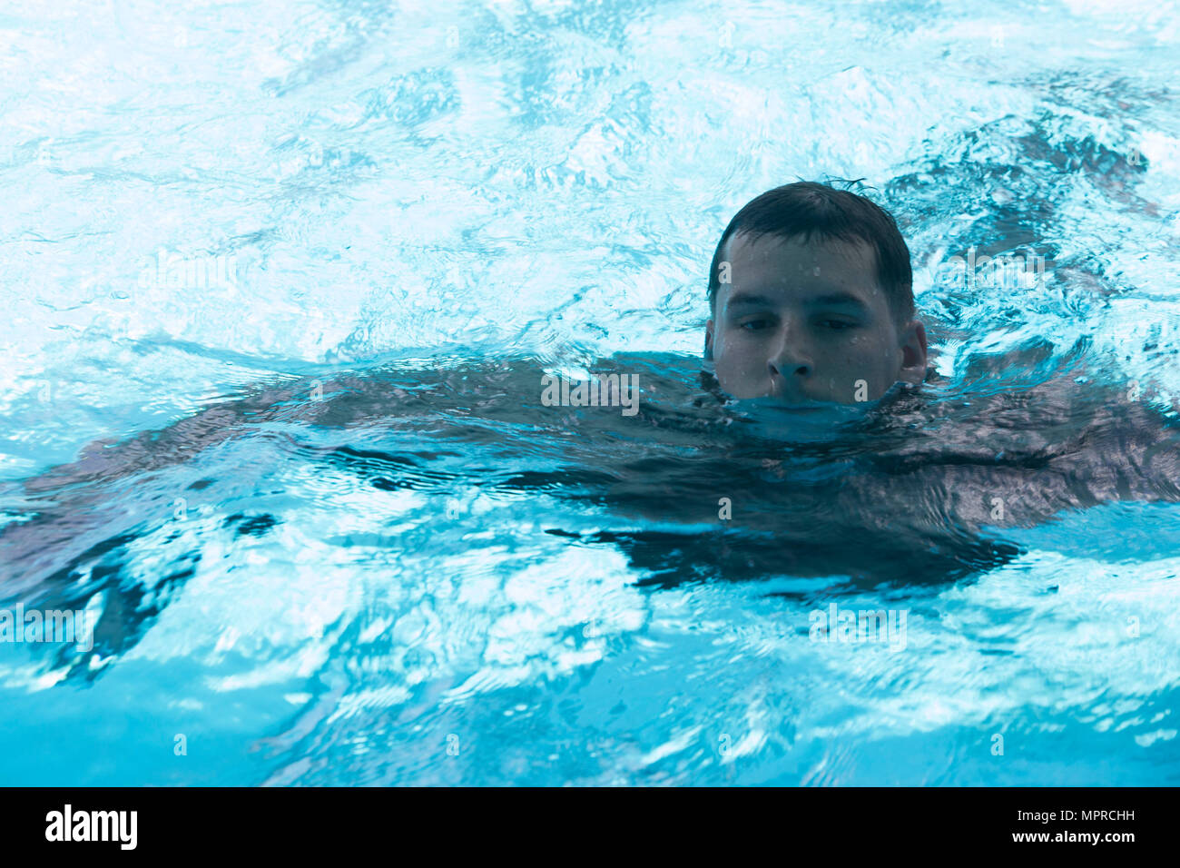 A Marine completes a 600 meter conditioning swim during Water Survival ...
