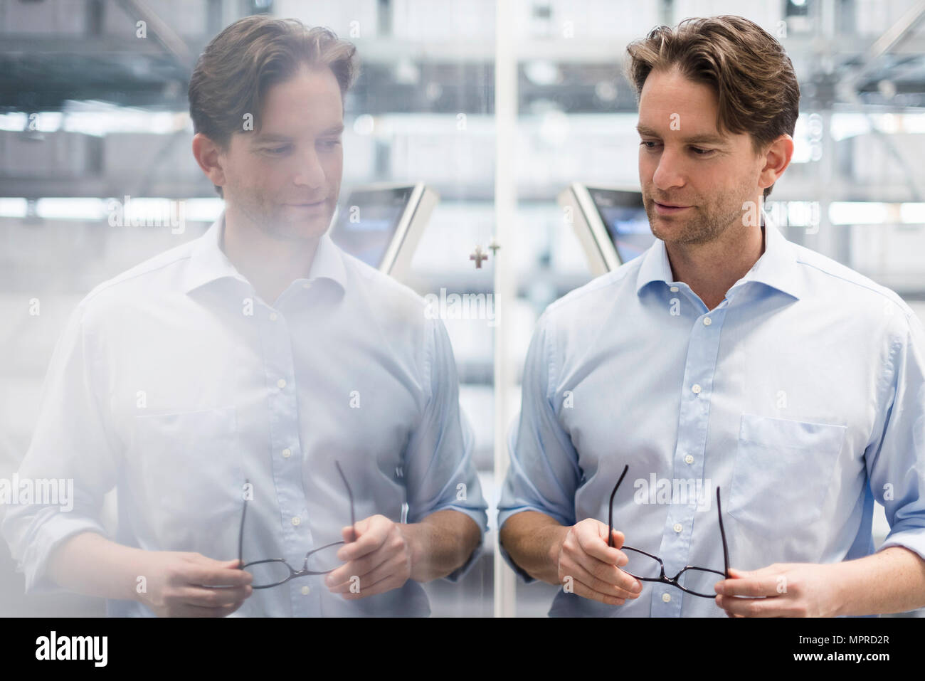 Glass reflected hi-res stock photography and images - Alamy