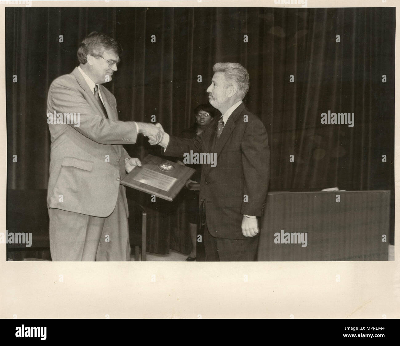 Admin. Atwood Honors-Ceremony USAID - Man receiving award on stage ...