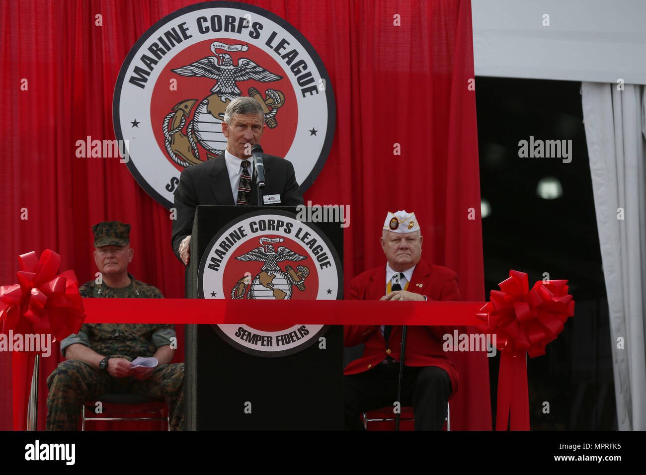 Michael Regner speaks at the opening ceremony of the Marine South Expo ...