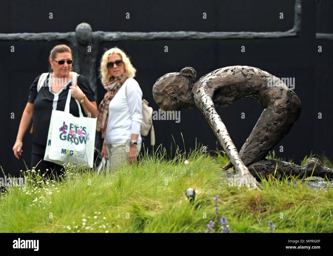 Visitors view the John O'Connor Sculpture exhibit at the RHS Chelsea ...