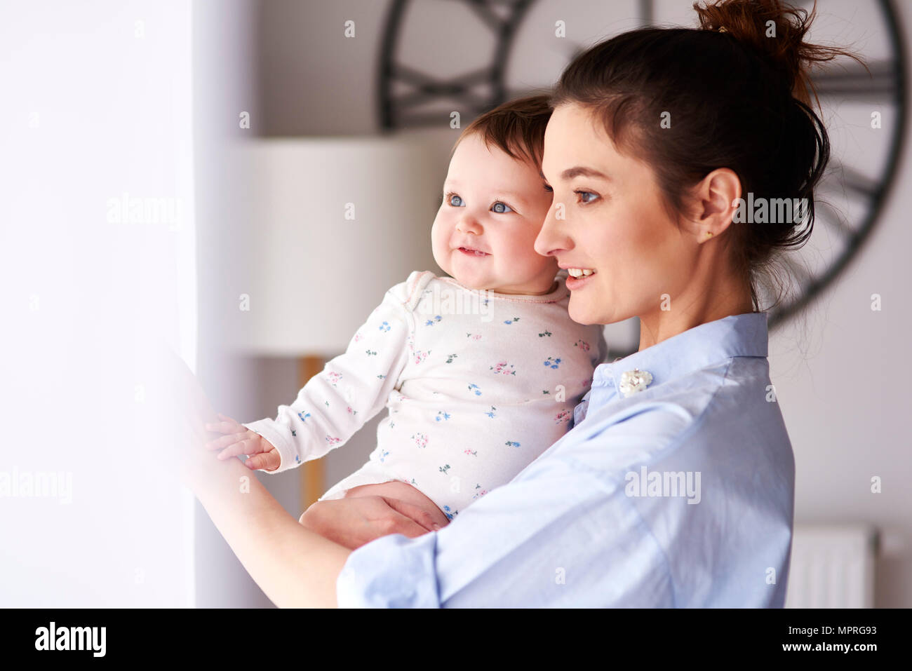 Carrying mother hi-res stock photography and images - Alamy