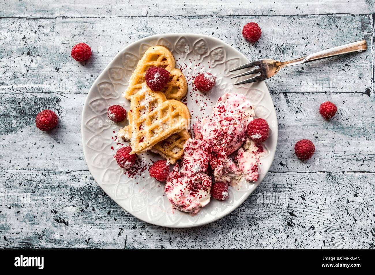 Homemade waffles with raspberry icecream, waffle hearts with ...