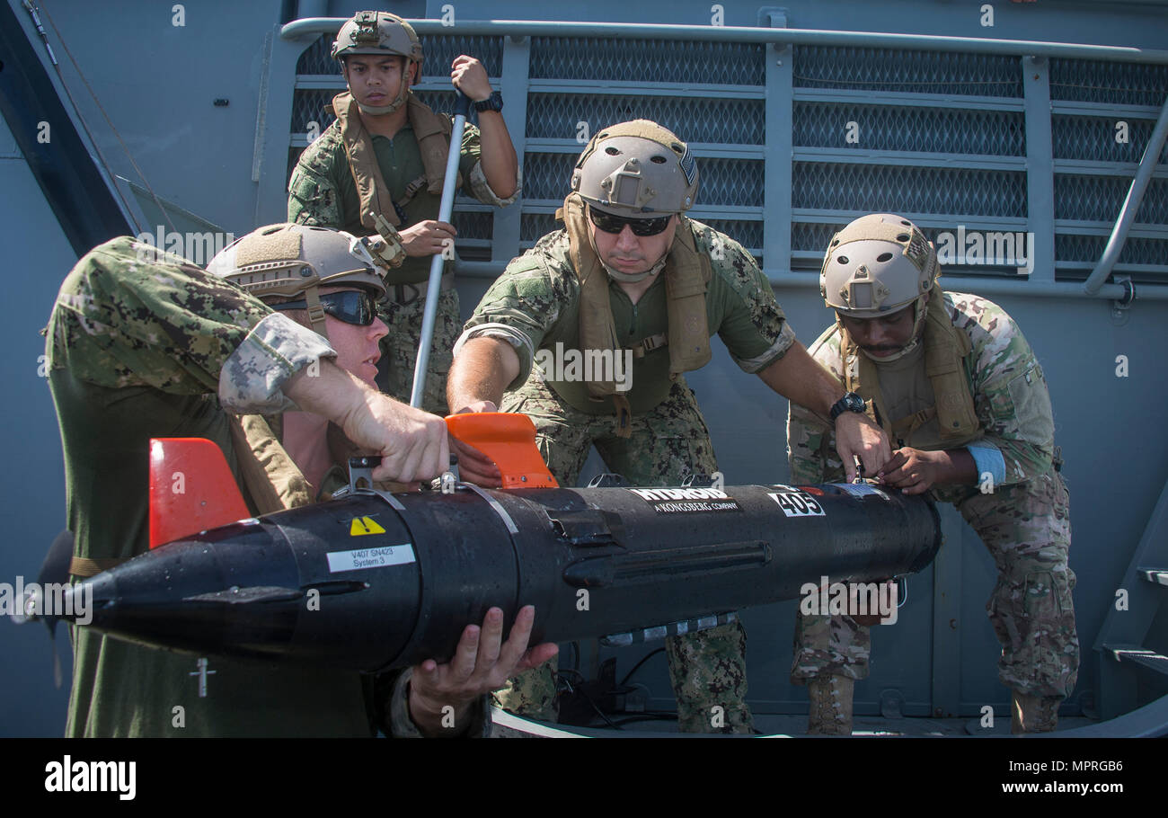 Sailors assigned to Explosive Ordnance Disposal Mobile Unit (EODMU) 5 ...