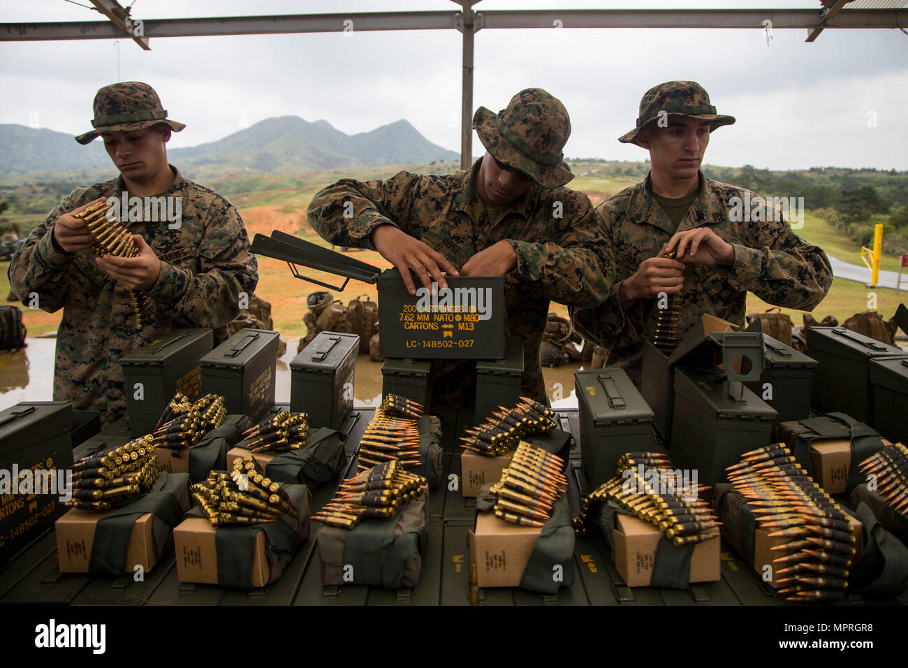U.S. Marines Cpl. Alan Graziano, left, Lance Cpl. Dyland Dickey, center ...