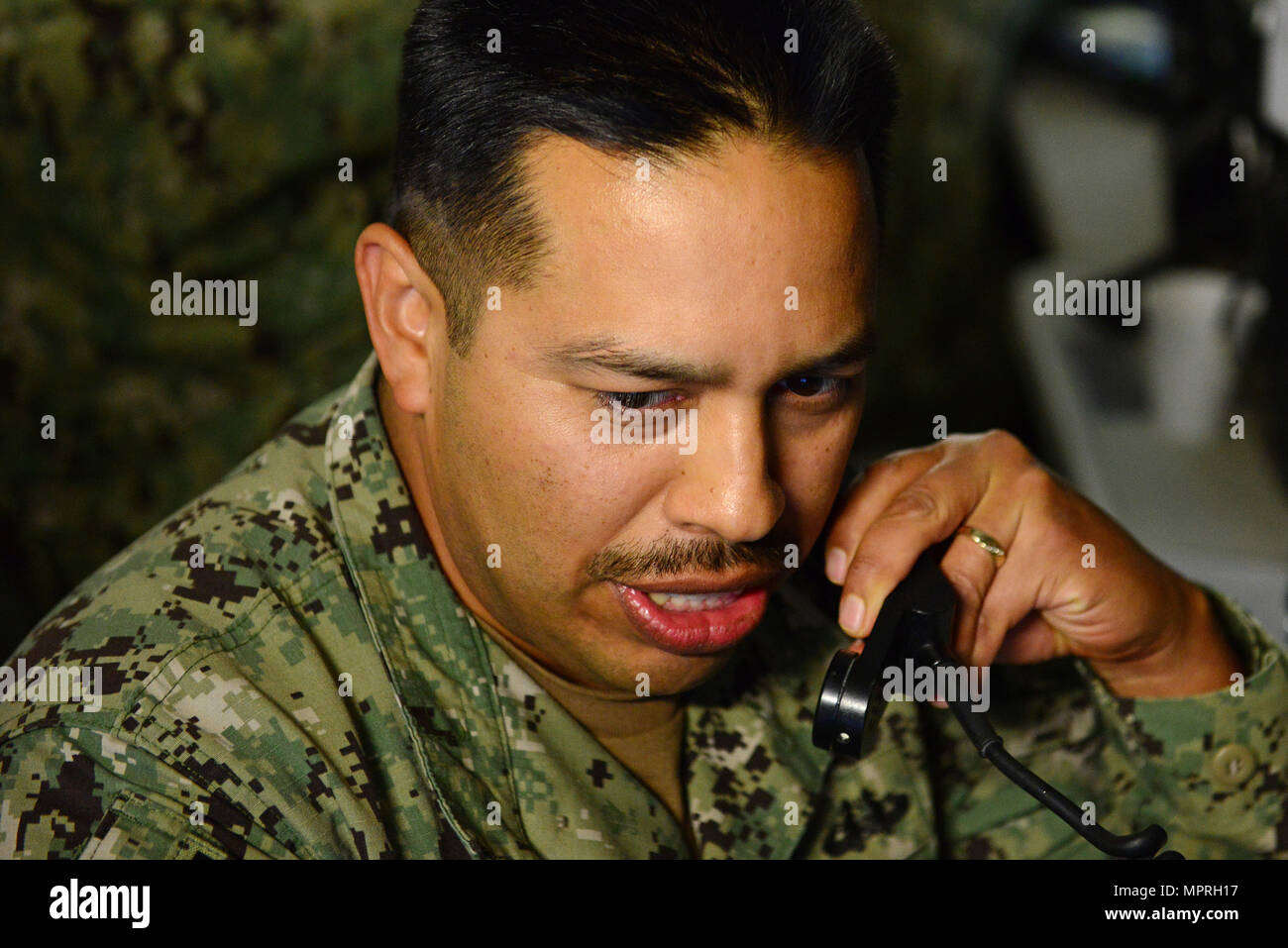 U.S. Coast Guard Petty Officer 1st Class Jonathan, an operations ...