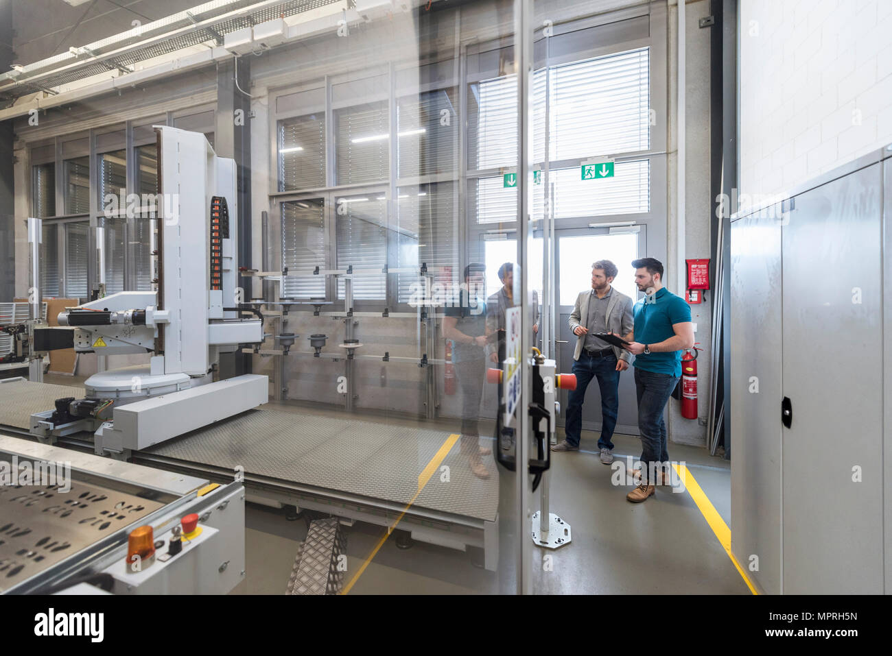 Machine men hi-res stock photography and images - Alamy