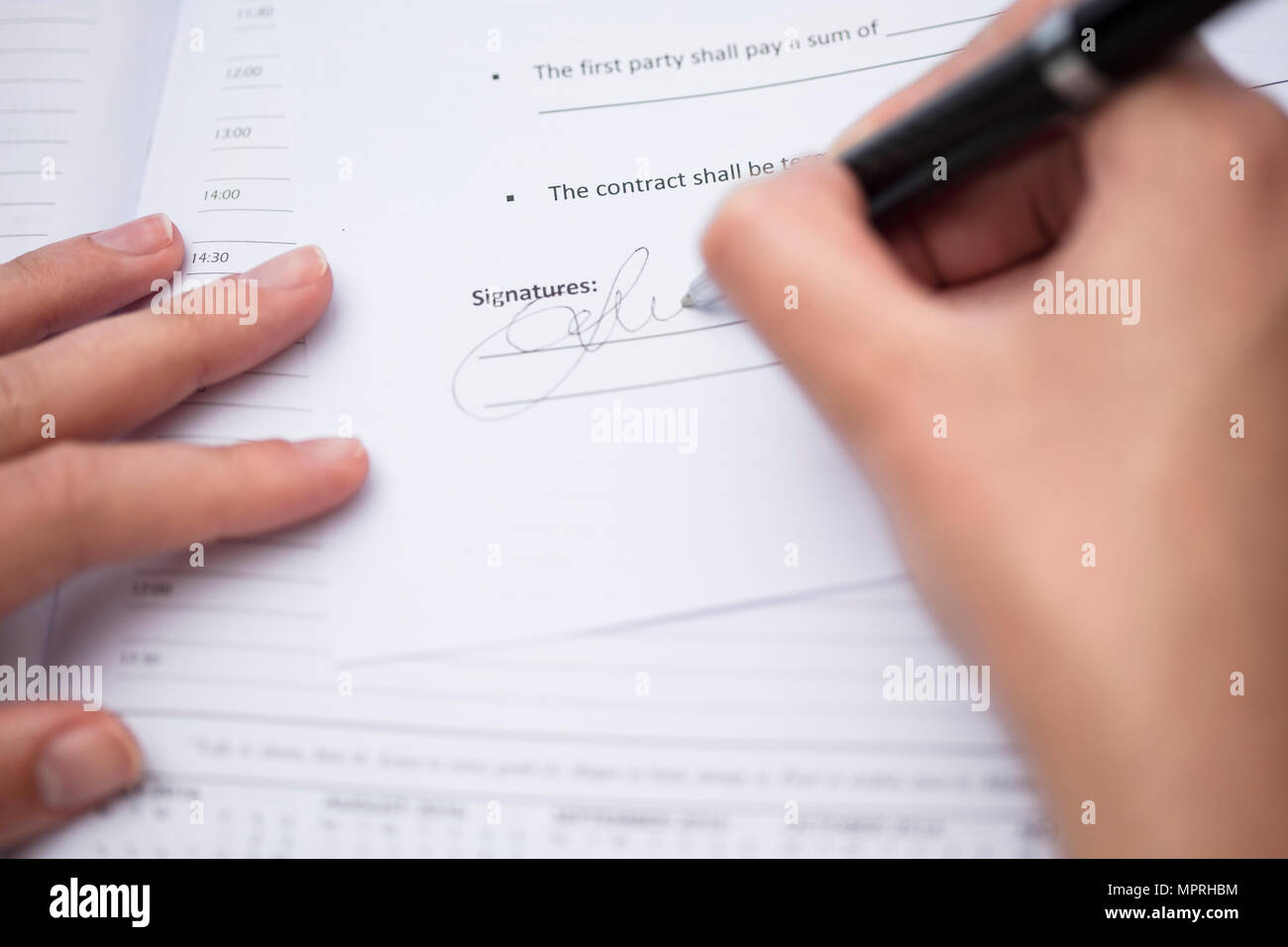 Office worker signing documents hi-res stock photography and images - Alamy