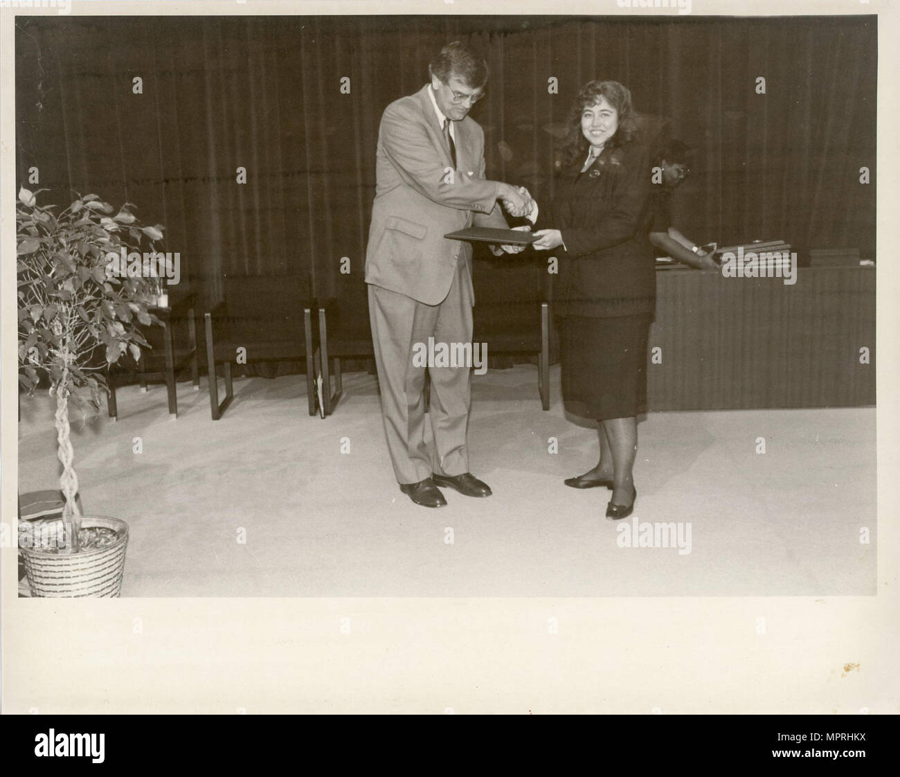Admin. Atwood presenting general awards - Woman receiving award on ...