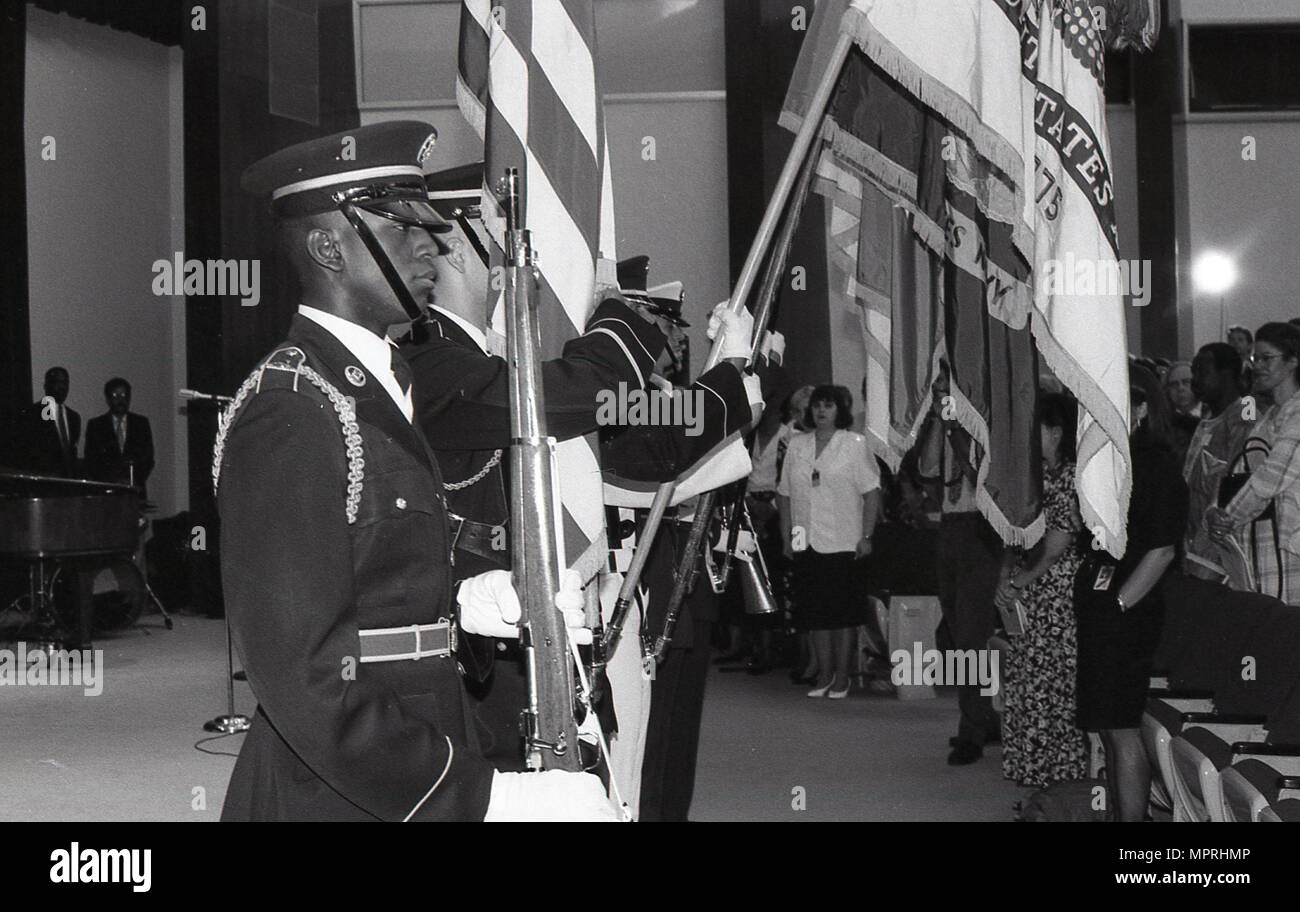 Admin. Atwood presenting general awards - Soldiers carrying flag Stock ...