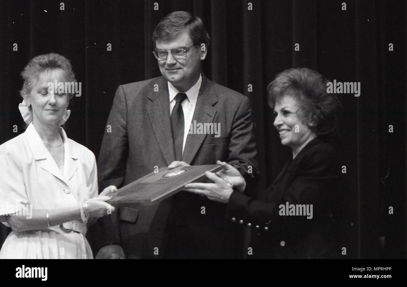 Admin. Atwood presenting general awards - Woman receiving award on ...