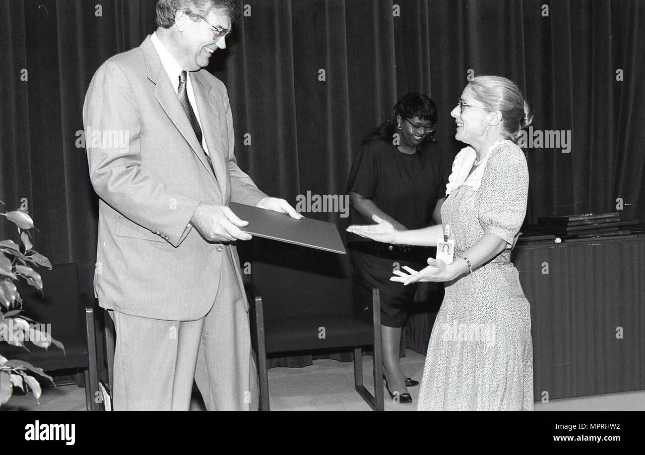 Admin. Atwood presenting general awards - Woman receiving award on ...