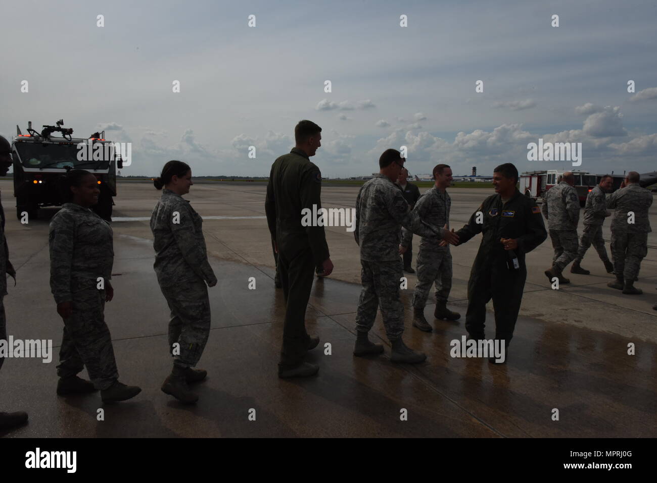 U.S. Air Force Maj. Gen. D. Todd Kelly shakes hands with airmen of the ...