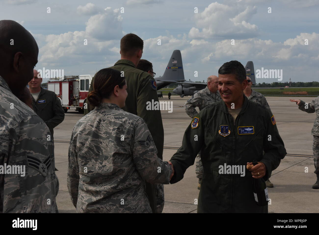 U.S. Air Force Maj. Gen. D. Todd Kelly shakes hands with airmen of the ...
