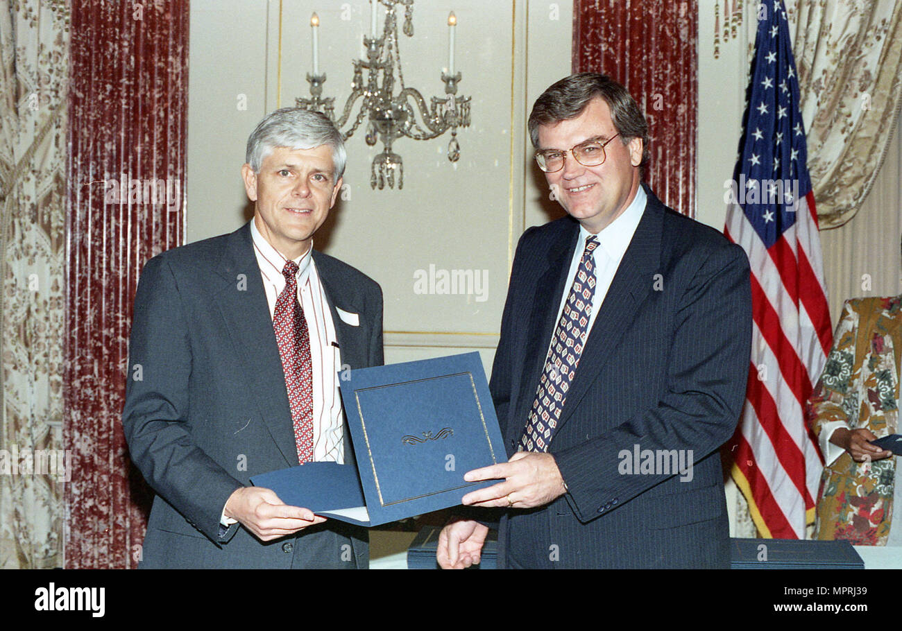 man accepting award taking a picture Stock Photo - Alamy