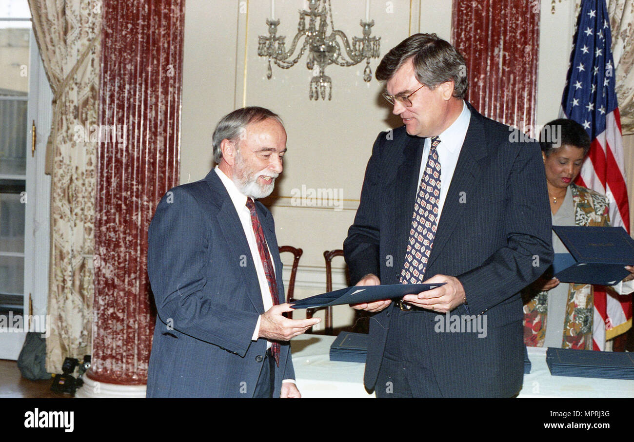 man accepting award taking a picture Stock Photo - Alamy