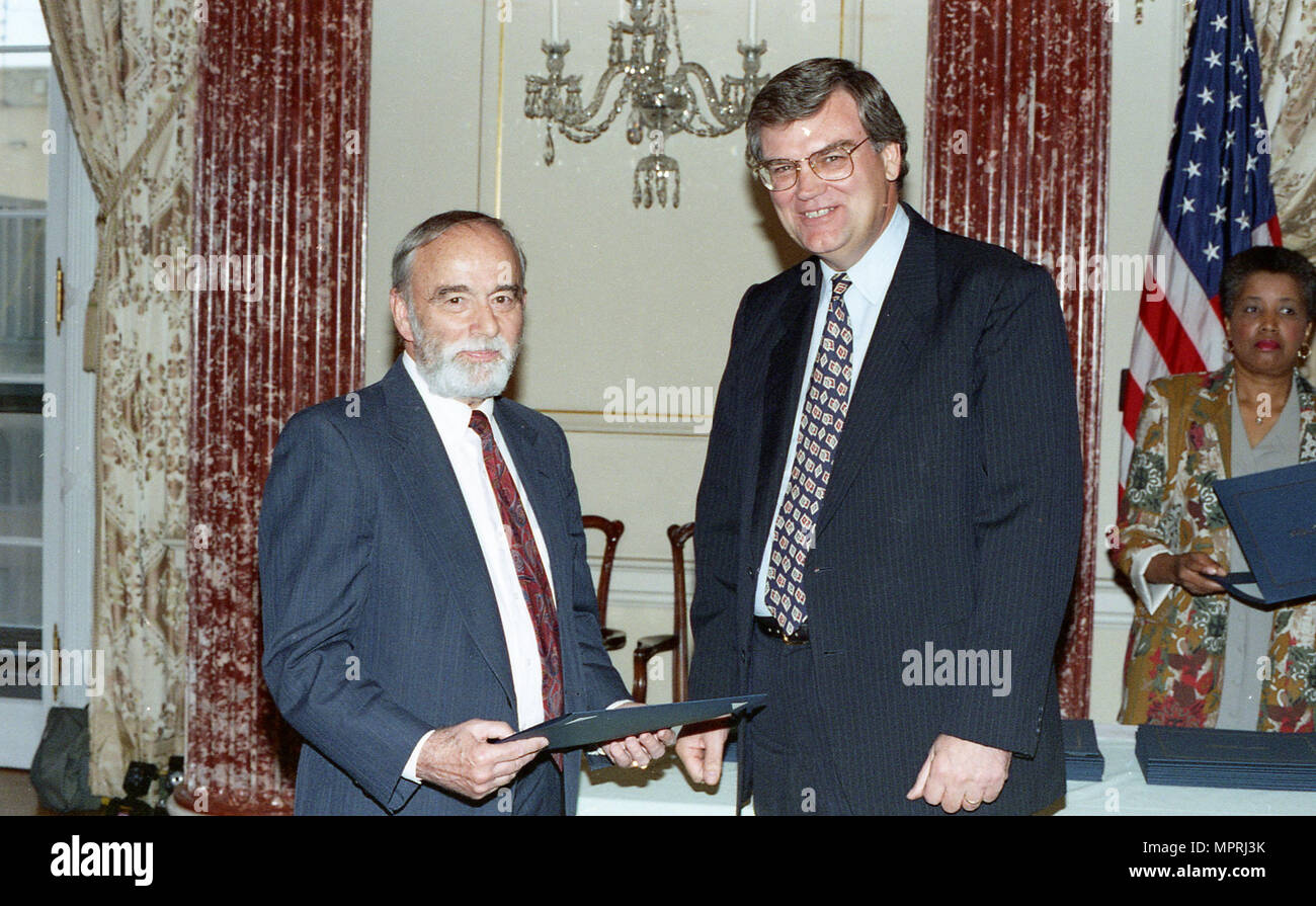 man accepting award taking a picture Stock Photo - Alamy