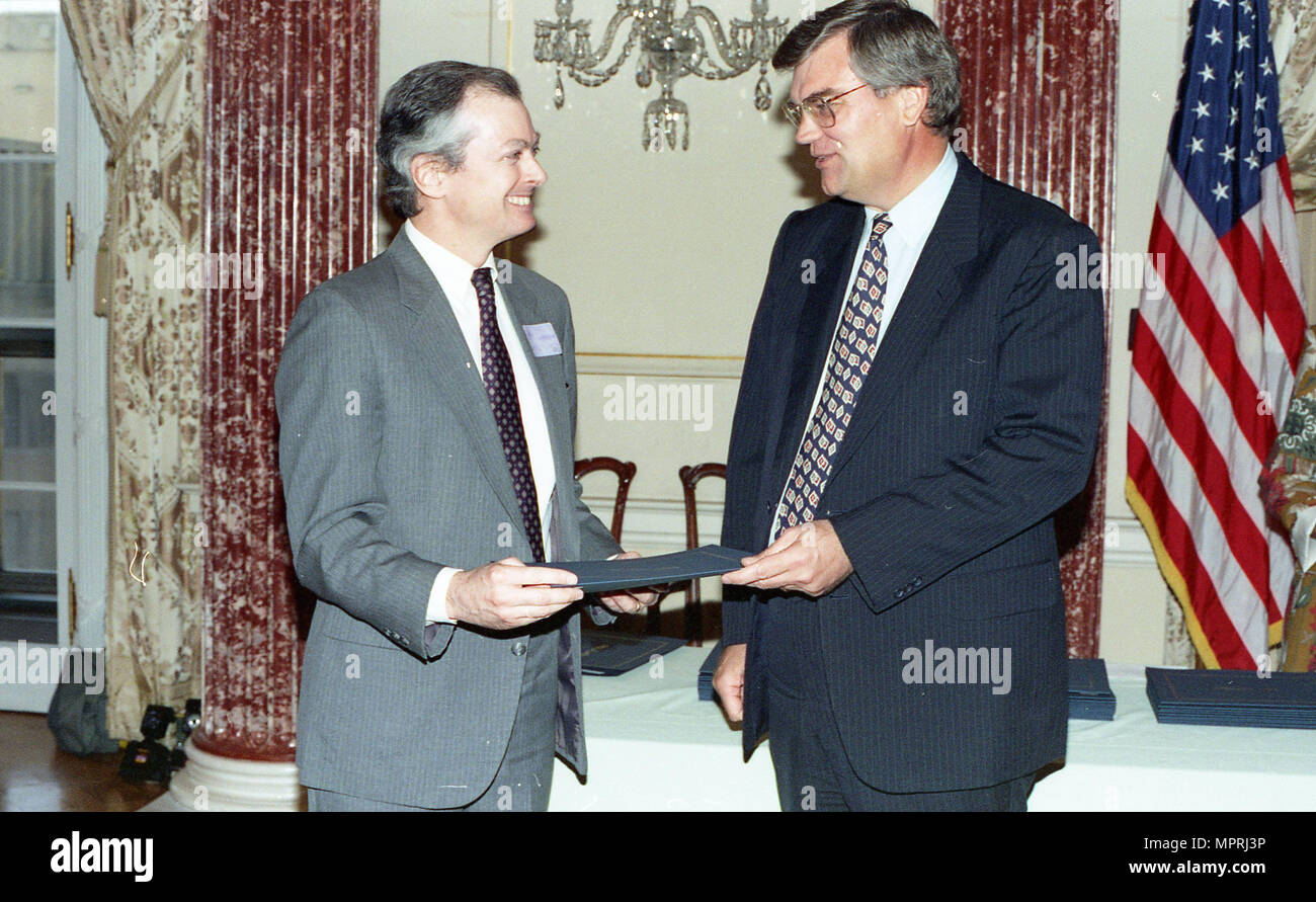 man accepting award taking a picture Stock Photo - Alamy