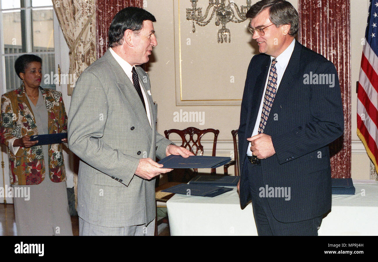 man accepting award taking a picture Stock Photo - Alamy