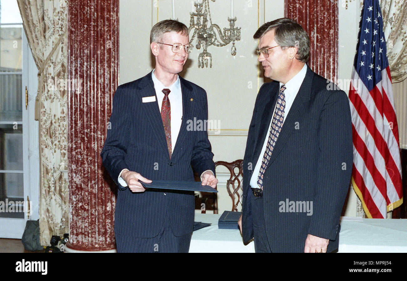 man accepting award taking a picture Stock Photo - Alamy
