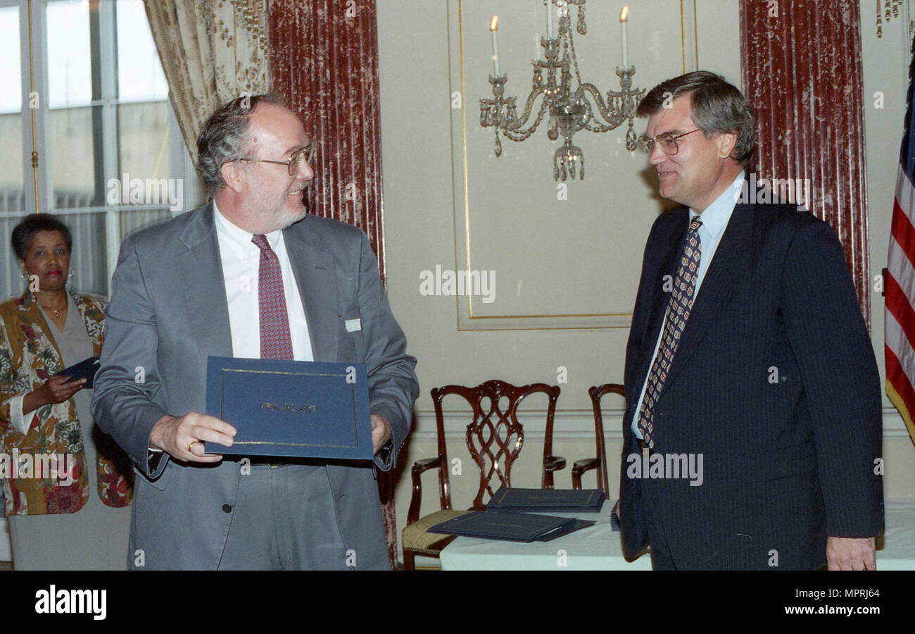 man accepting award taking a picture Stock Photo - Alamy
