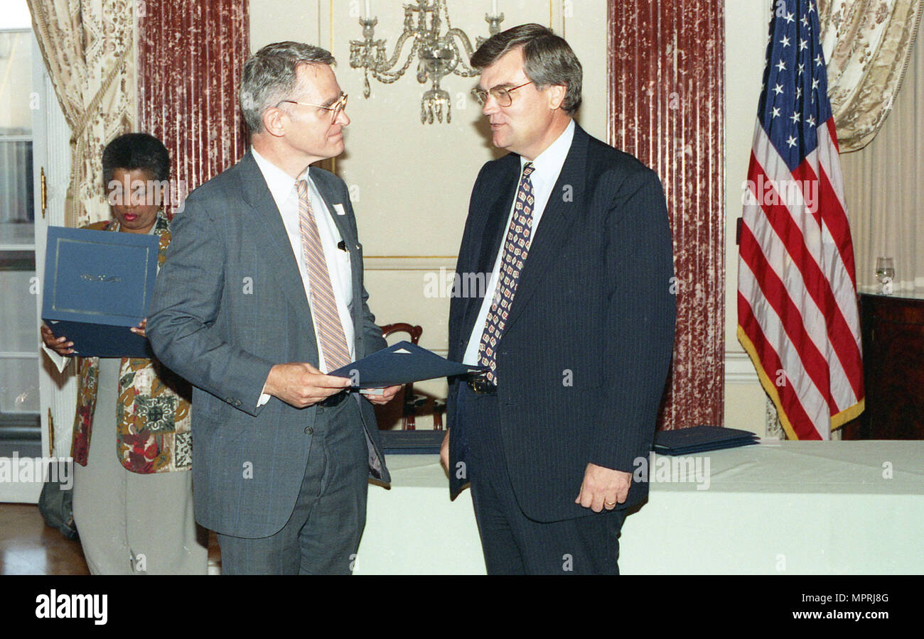 man accepting award taking a picture Stock Photo - Alamy